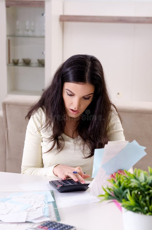 The Young Woman with Receipts in Budget Planning Concept Stock Image ...