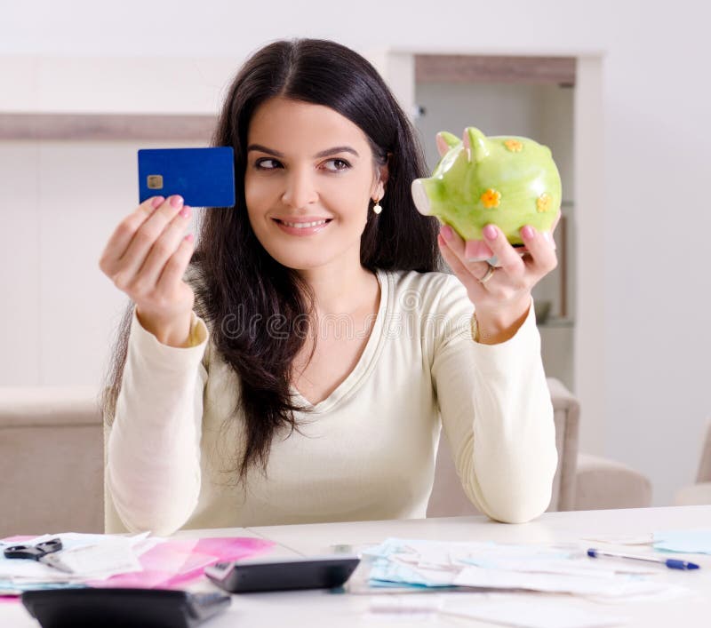 Young Woman with Receipts in Budget Planning Concept Stock Photo ...