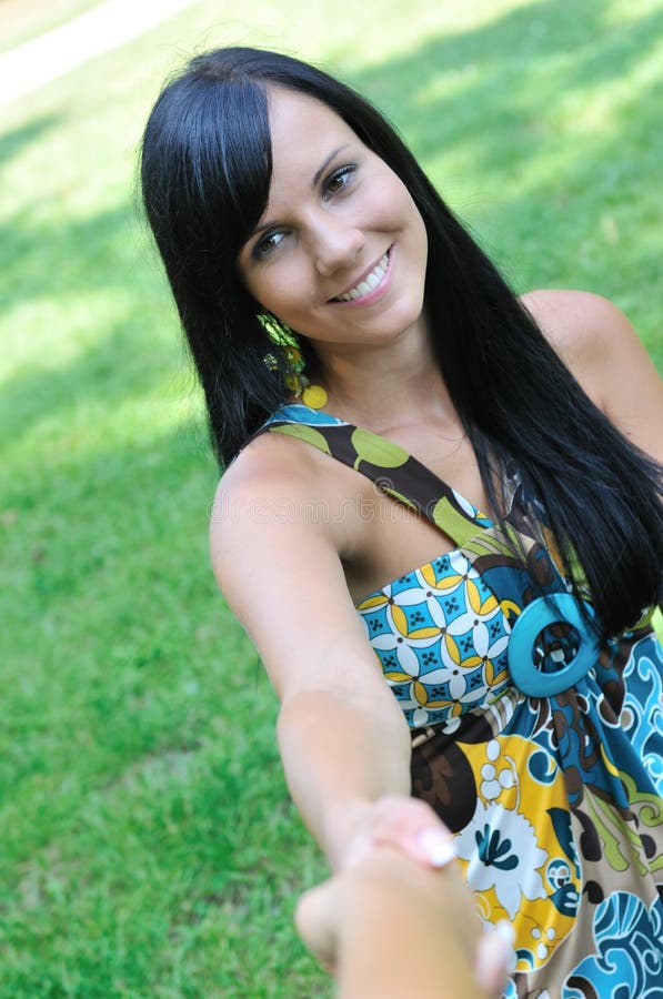 Young Woman Receiveing Helping Hand Stock Image - Image of grass, adult ...