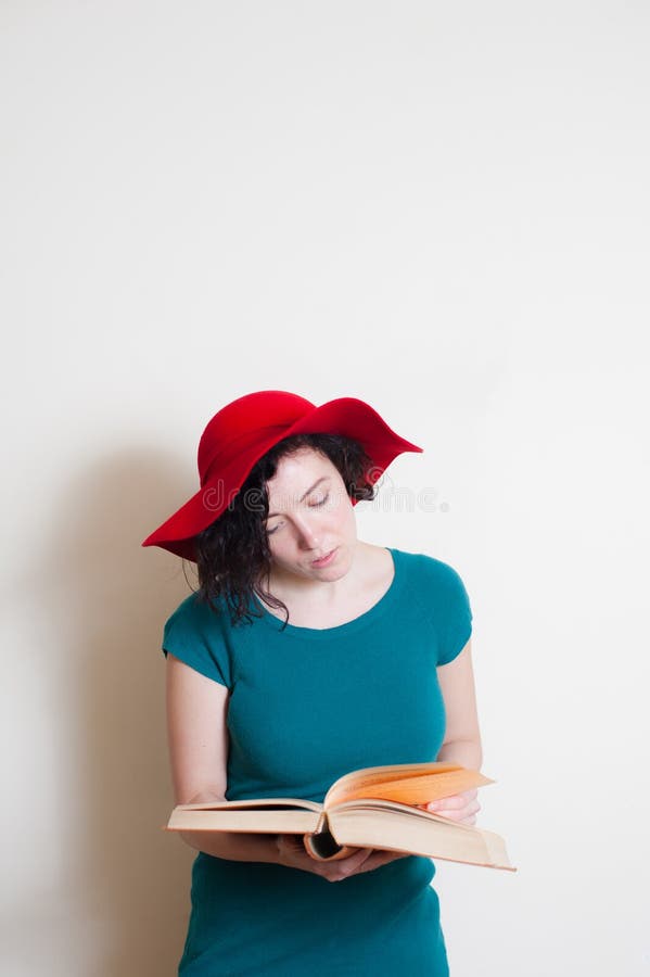 Young Woman with Red Hat Reading Book Stock Image - Image of face, girl ...