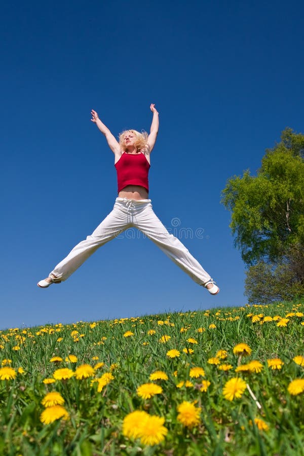 Young Woman in Red Outfit Having Fun on Meadow Stock Image - Image of ...