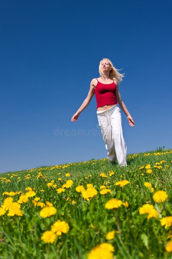 Young Woman in Red Outfit Having Fun on Meadow Stock Image - Image of ...