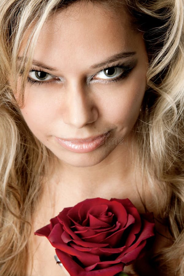 Young Woman with a Red Rose Stock Image - Image of makeup, eyes: 23188435