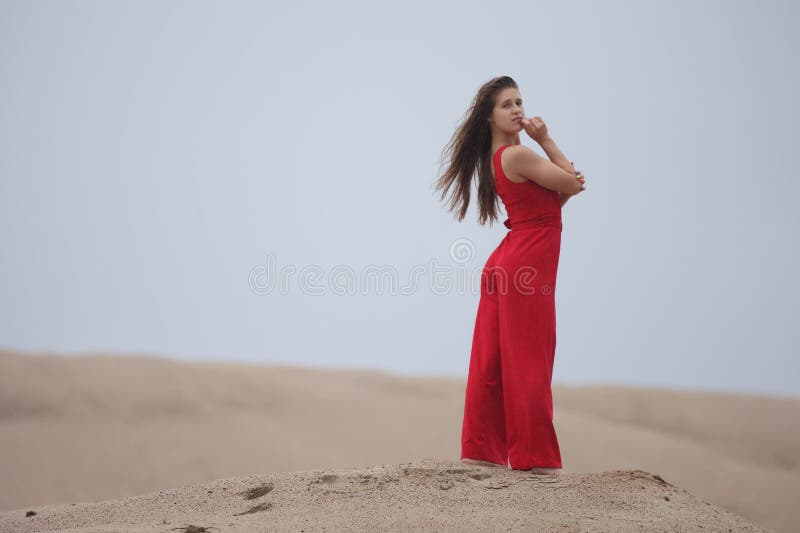 Young Woman in Red on the Sand Stock Image - Image of desert ...