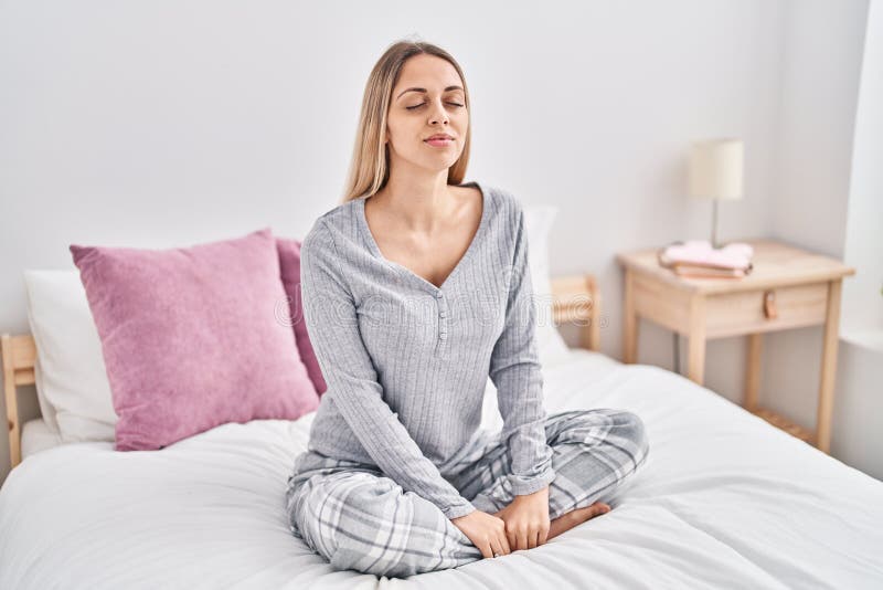 Young Woman Relaxed Sitting on Bed at Bedroom Stock Photo - Image of ...