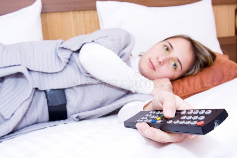 Young Woman with a Remote Control Stock Photo - Image of house ...