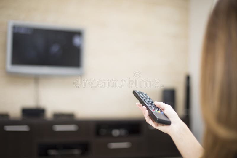 Young Woman with Remote Control Stock Image - Image of lifestyle ...