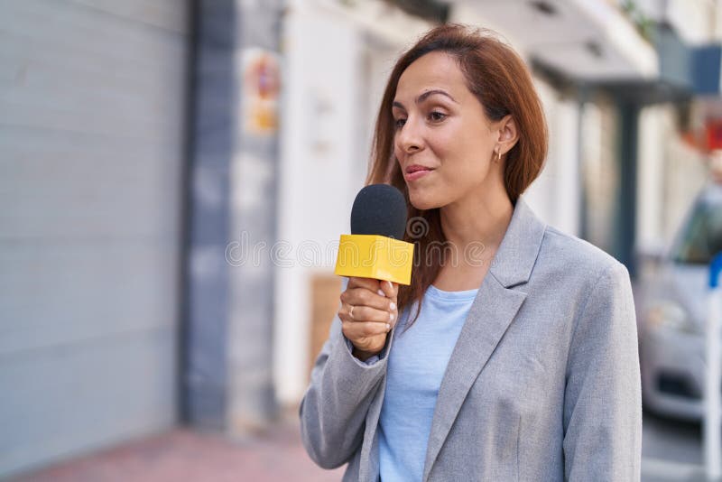 Young Woman Reporter Working Using Microphone at Street Stock Photo ...