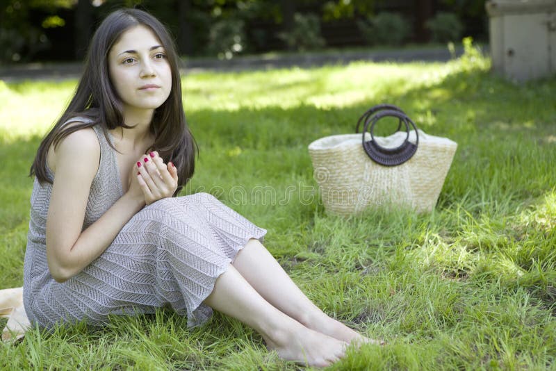 Young Woman Resting in Park Stock Photo - Image of park, beautiful ...