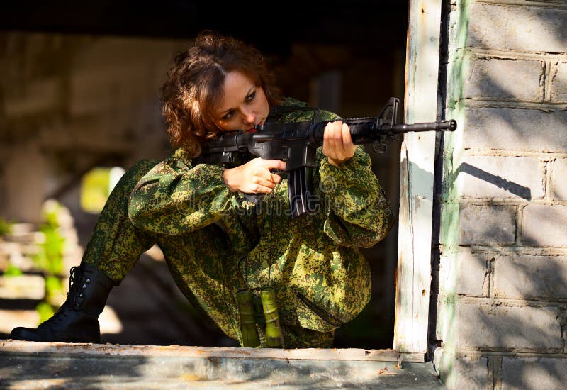 Woman Sniper and Soldier Aiming Rifle at Window Stock Photo - Image of ...