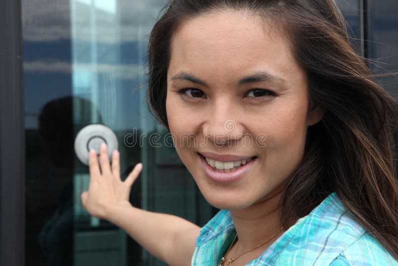 Young woman ringing bell stock image. Image of confident - 33514193