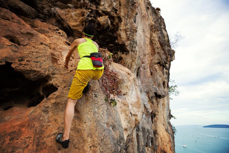 Woman Rock Climber Climbing at Seaside Cliff Stock Photo - Image of ...