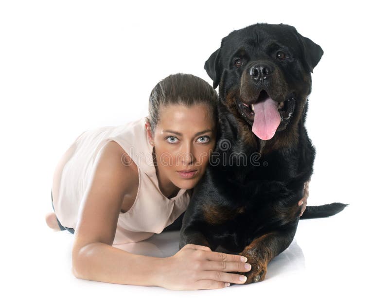 Young woman and rottweiler stock photo. Image of rottweiler - 60097332