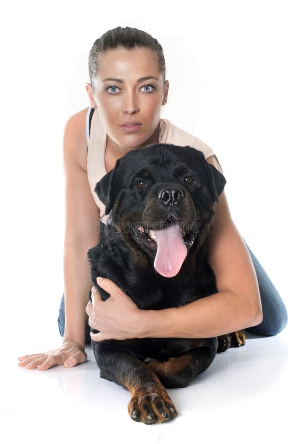 Young woman and rottweiler stock photo. Image of rottweiler - 60097332