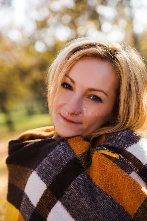 Young woman in a rug stock image. Image of lady, attractive - 64070445