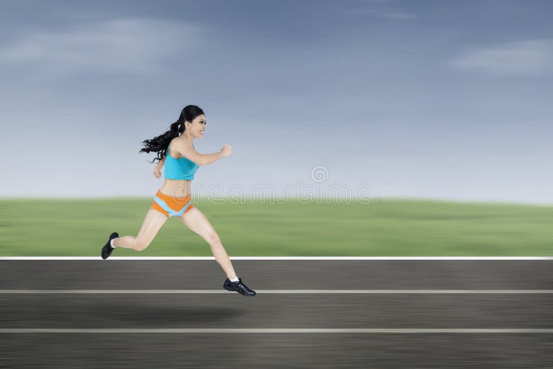 Young Woman Running on the Field Stock Image - Image of active ...