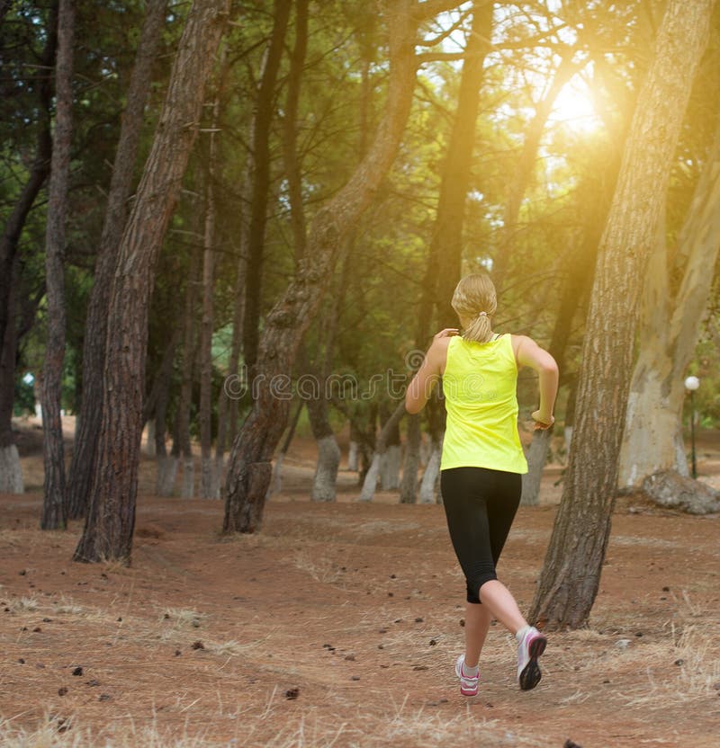 Young woman running. stock photo. Image of path, forest - 61987726