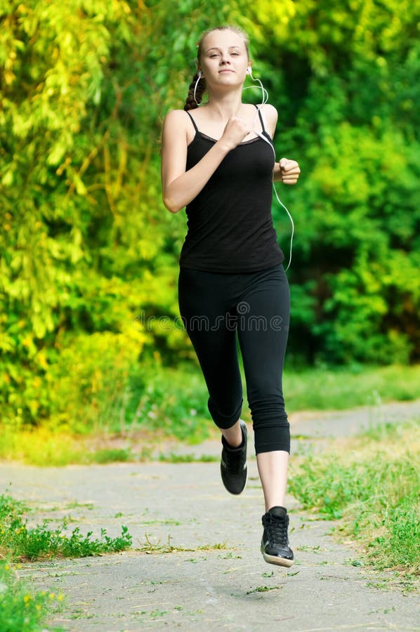 Young Woman Running in Green Park Stock Photo - Image of outside ...