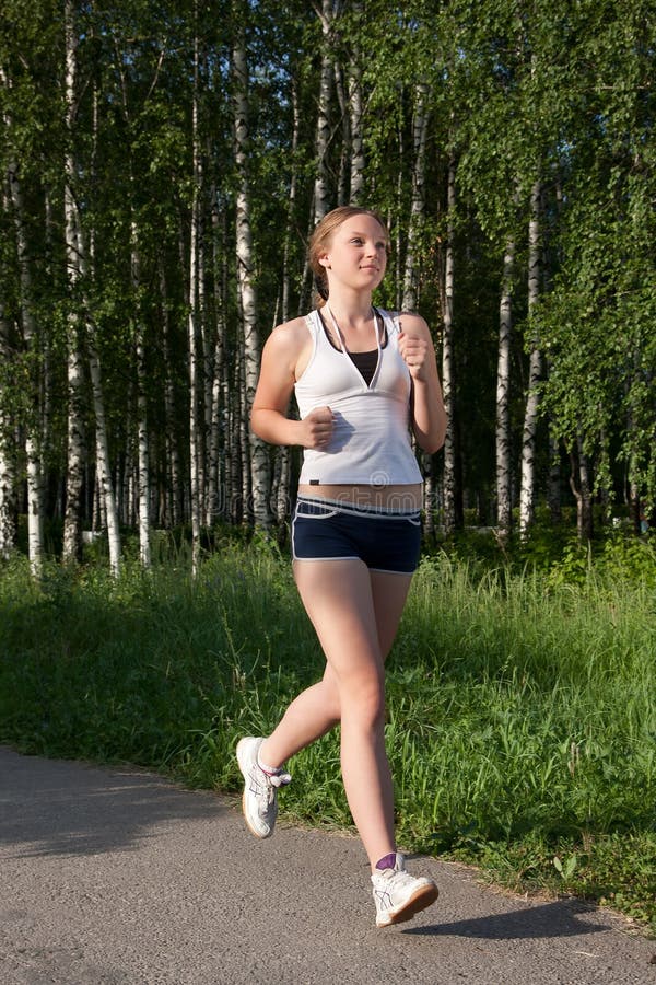 Young Woman Running Outdoors Stock Photo - Image of park, athletic ...