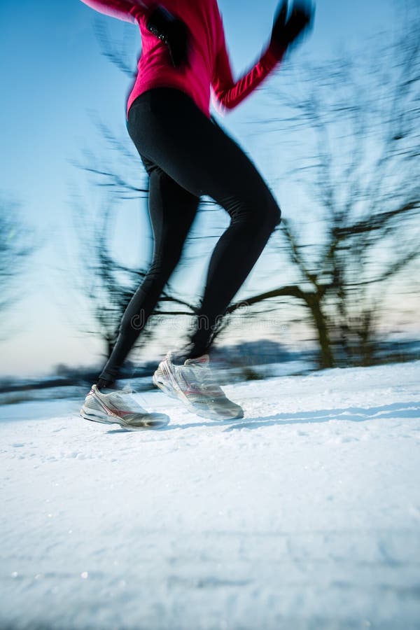 Young Woman Running Outdoors on a Cold Winter Day Stock Image - Image ...