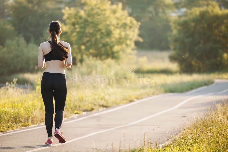 Young Woman Running in Park Stock Photo - Image of lifestyle, fitness ...