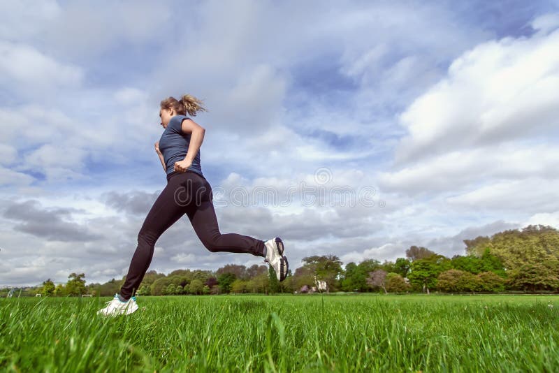 Young woman running stock photo. Image of meadow, female - 31313290