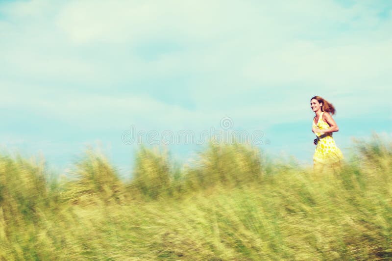 Young Woman Running through Tall Grass Stock Image - Image of child ...