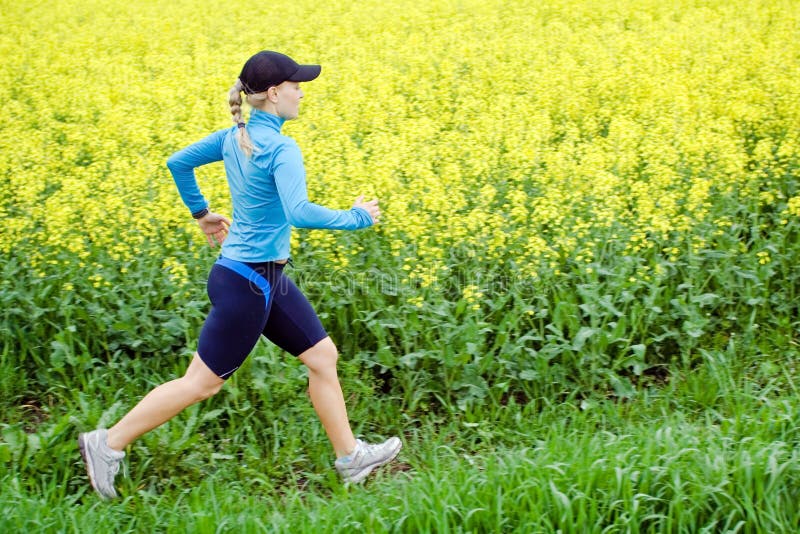 Young Woman Running on Trail Stock Photo - Image of grass, action: 14341738