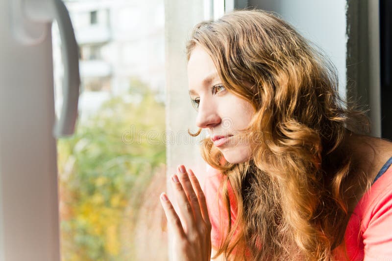 Sad Woman Looking Out Window Stock Image - Image of fashion, hairs ...