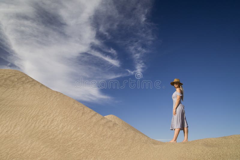 Young Woman on Sandy Mountain Stock Photo - Image of legs, body: 247935824