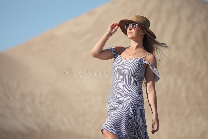 Young Woman on Sandy Mountain Stock Image - Image of freedom, outdoor ...