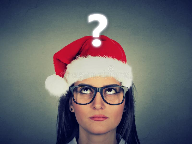 Young Woman in Santa Claus Hat with Question Mark Stock Image - Image ...