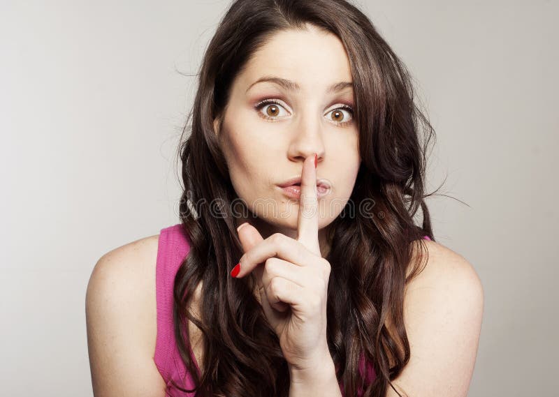 Young woman saying shh stock image. Image of beauty, face - 50425323