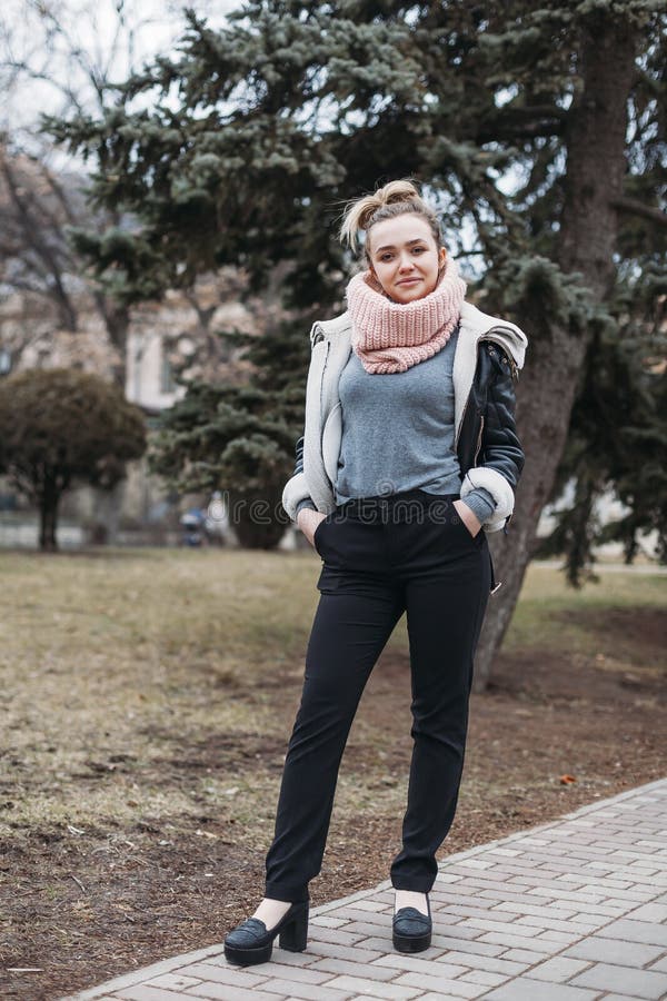Young Woman in a Scarf Poses in a Park Stock Image - Image of clothes ...