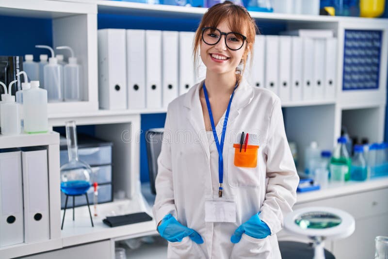 Young Woman Scientist Smiling Confident Standing at Laboratory Stock ...