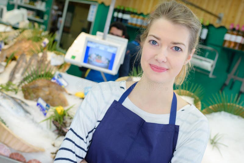 Young Woman Selling Fish at Store Stock Photo - Image of work, male ...