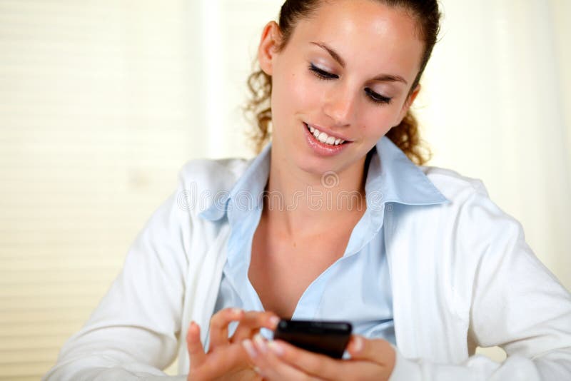 Young Woman Sending a Message by Cellphone Stock Photo - Image of ...