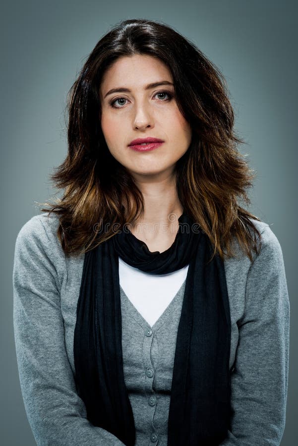 Young Woman with Serious Expression Stock Image - Image of front ...