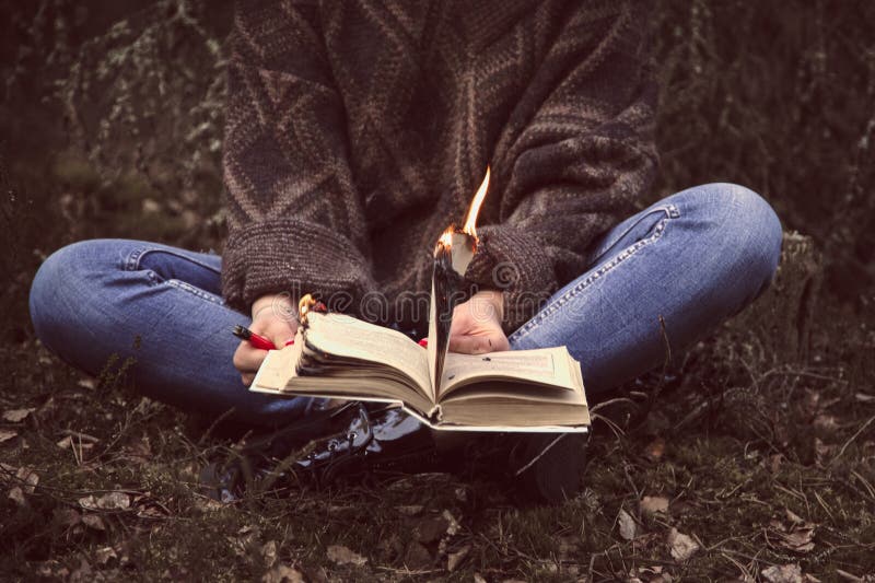 Young Woman Sets Fire To a Book Stock Photo - Image of witch, magic ...