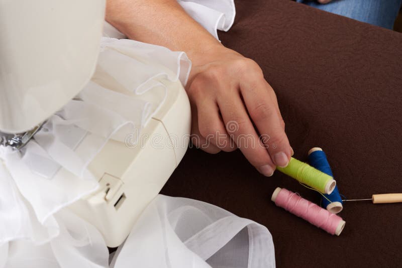 Young woman sewing fabric stock image. Image of industrial - 81923107