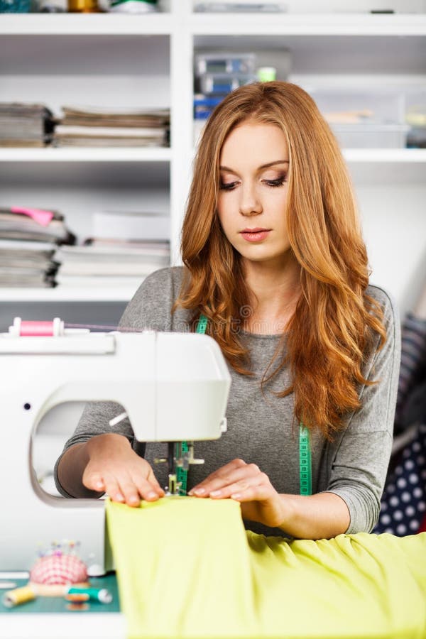 Young Woman at a Sewing Machine Stock Image - Image of fashion, people ...