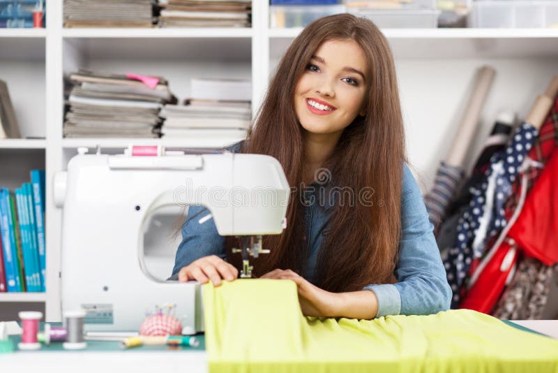 Young Woman at a Sewing Machine Stock Image - Image of clothing ...