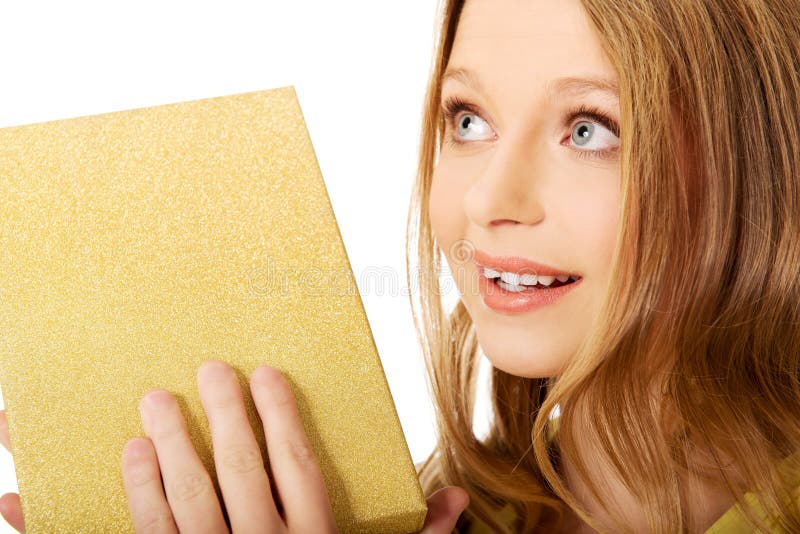 Young Woman Shaking the Gift Box Stock Photo - Image of celebration ...