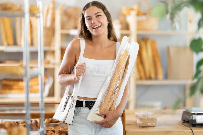 Young Woman with Baguette in Bakery Stock Image - Image of baked ...