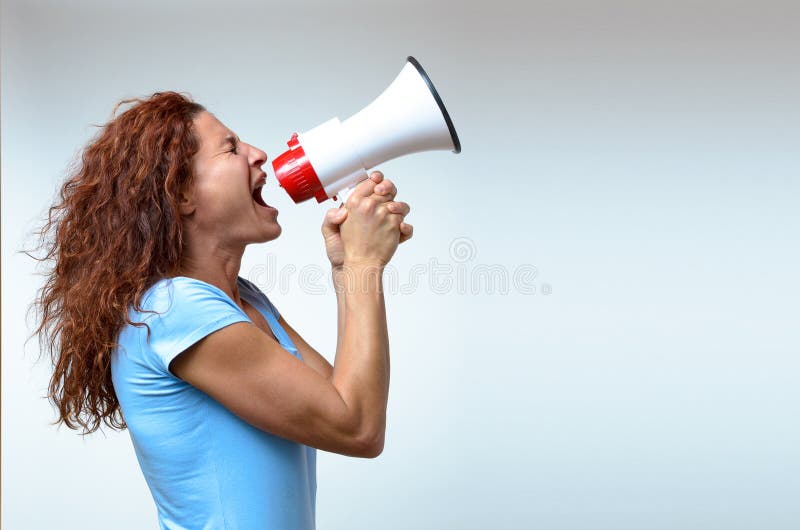 Young Woman Shouting into a Megaphone Stock Photo - Image of message ...