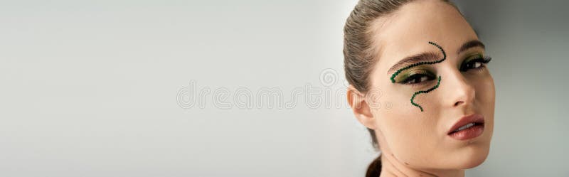 Embodying Elegance: Stunning Snake Makeup Highlights Stock Photo ...