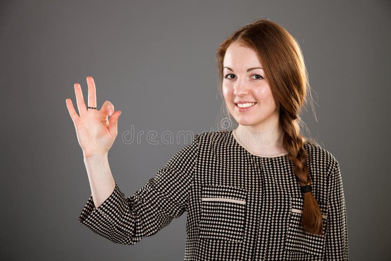 Young Woman Showing Positive Gesture Stock Image - Image of beautiful ...