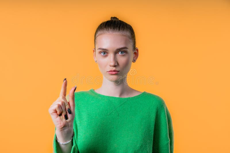 Young Woman Showing Small Invisible Abstract Subject, Tiny Object Sizes ...