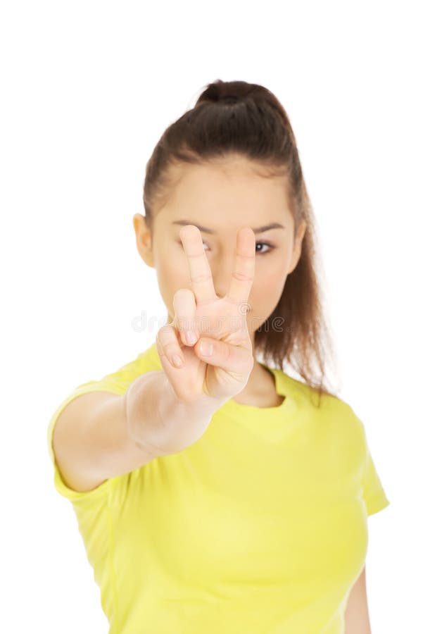 Young Woman Showing Victory Sign. Stock Photo - Image of teen, female ...