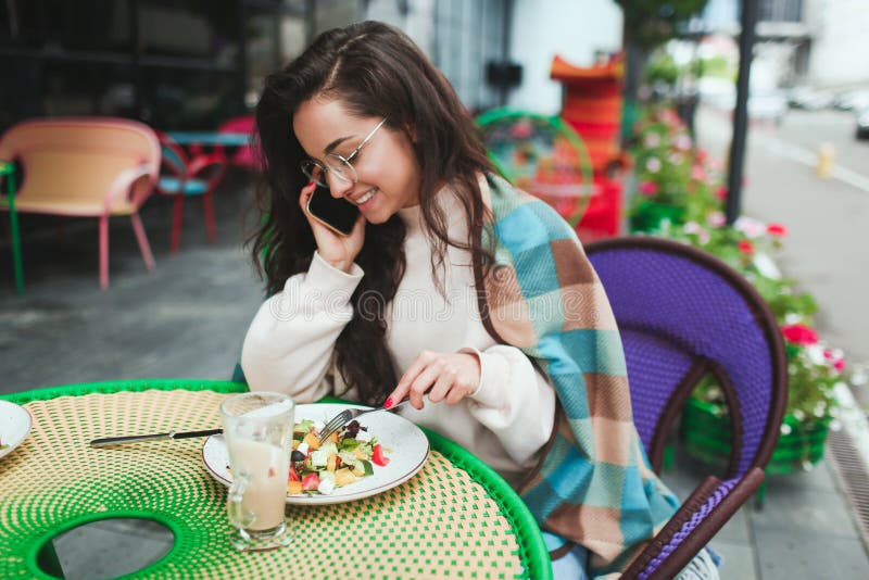 Young Woman Sit Alone In Cafe Or Restaurant Beautiful Positive Girl